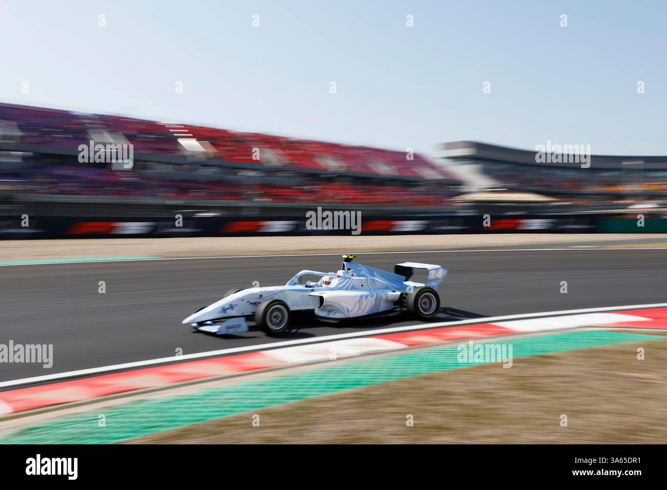 China's first female driver Shi Wei in action during the race of ...