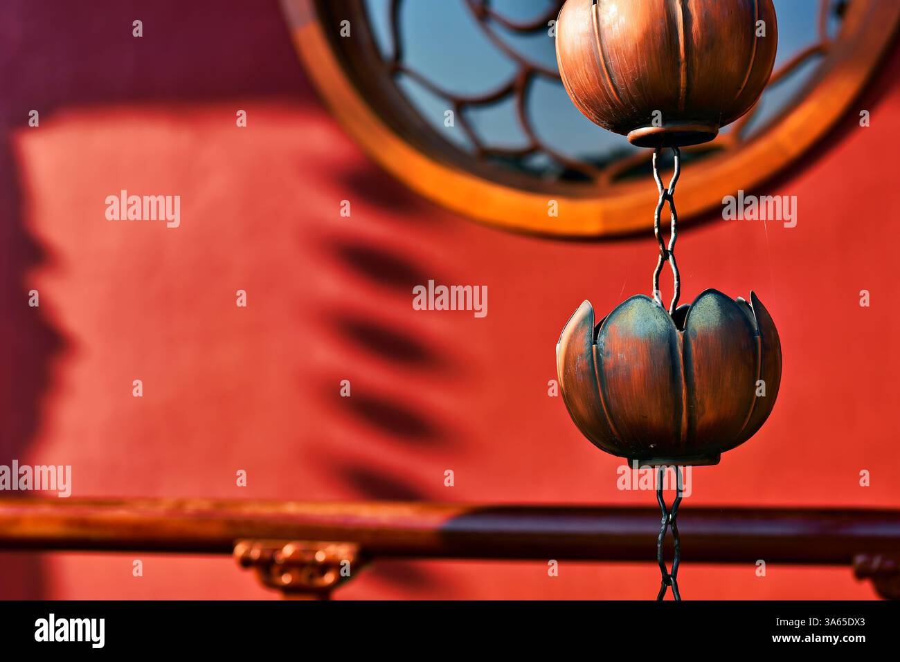Bronze lotus, a symbol of the monastery, hanging from the roofs of ...