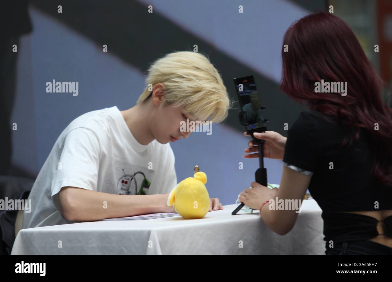 Chinese singer Zhao Rang attends an activity in Wuhan City, central ...
