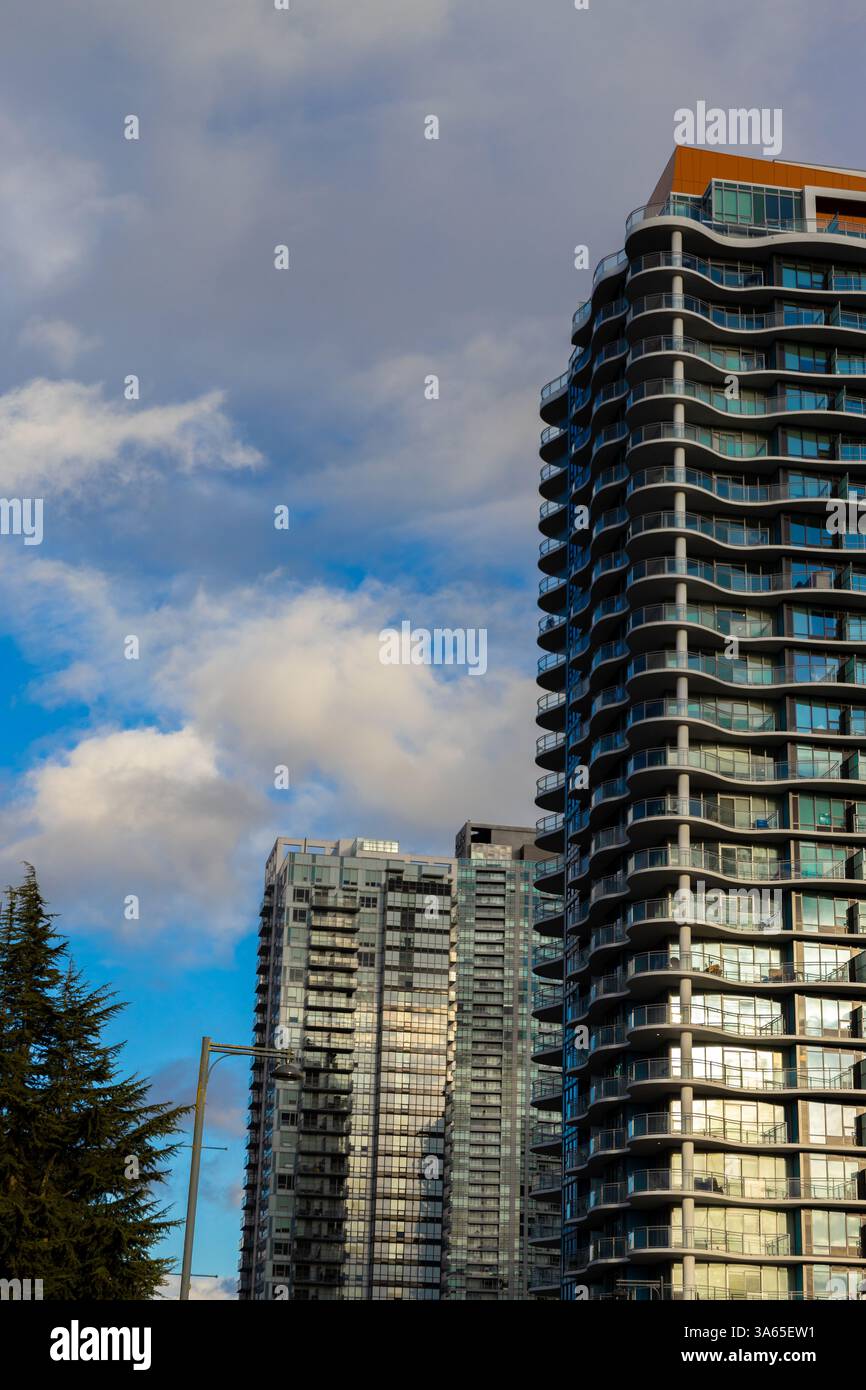 Modern skyscraper with blue sky and clouds in Surrey, March 2025 Stock ...