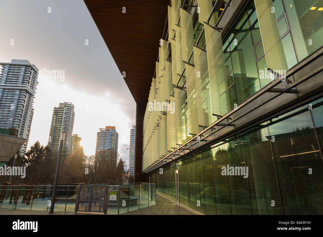 Modern building with skyline and clouds in surrey city hall, March 2025 ...