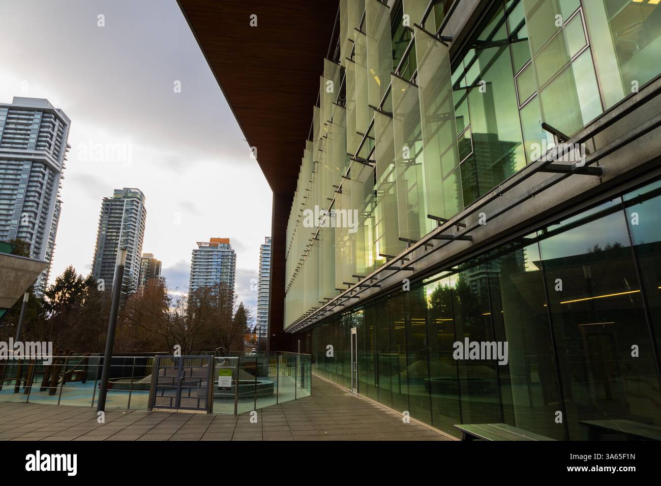 Modern building with skyline and clouds in surrey city hall, March 2025 ...