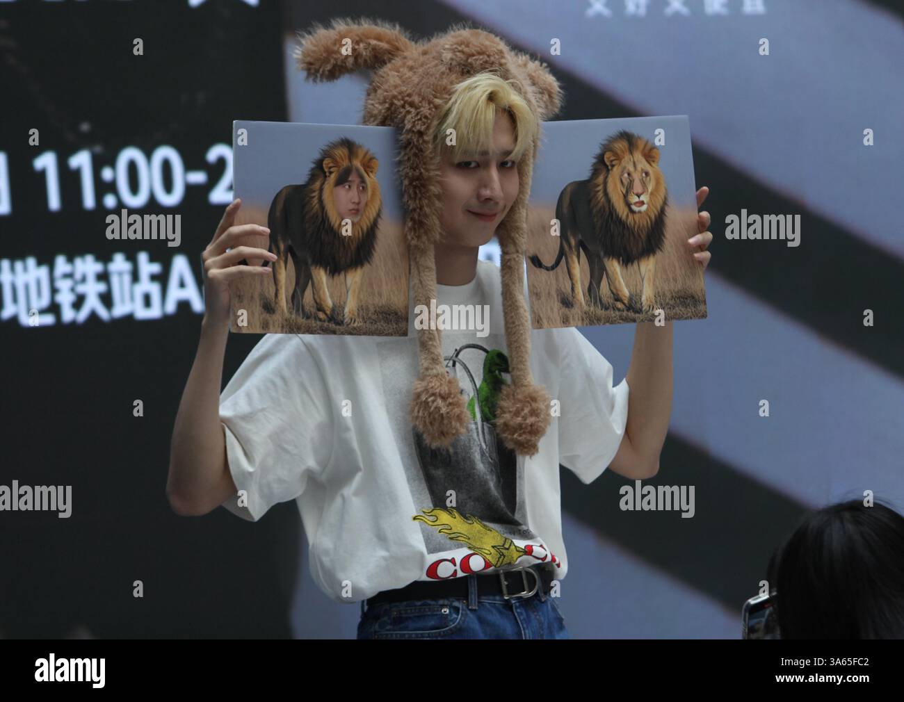 Chinese singer Zhao Rang attends an activity in Wuhan City, central ...
