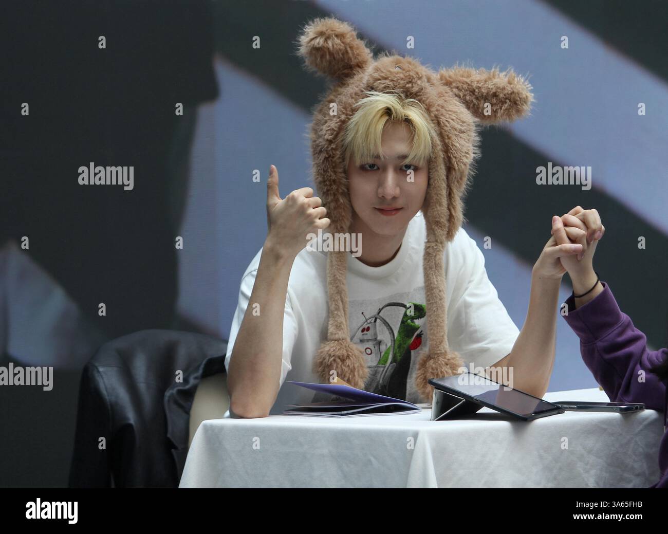 Chinese singer Zhao Rang attends an activity in Wuhan City, central ...