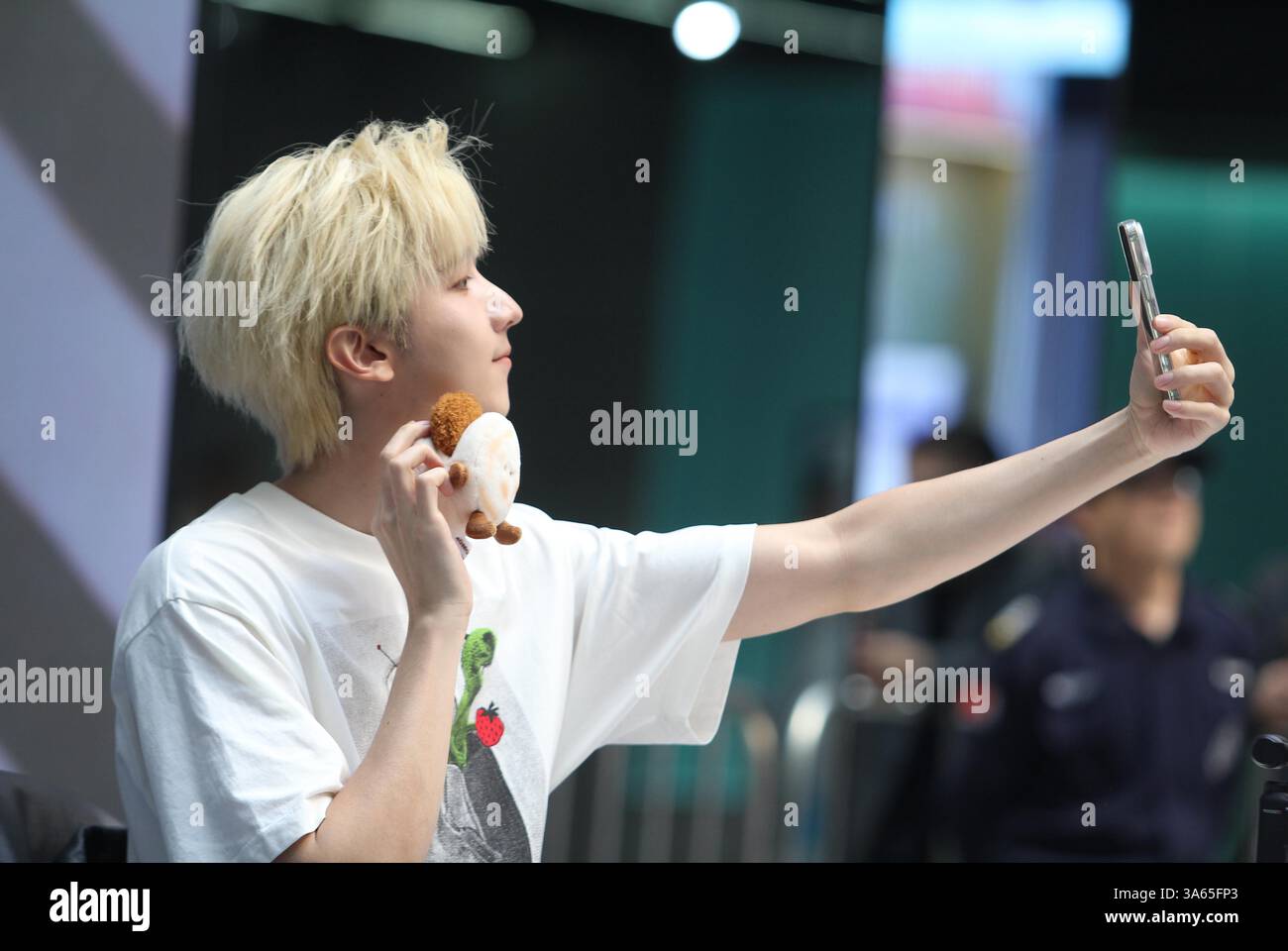 Chinese singer Zhao Rang attends an activity in Wuhan City, central ...