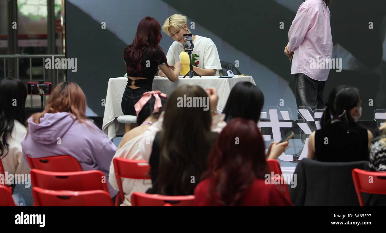 Chinese singer Zhao Rang attends an activity in Wuhan City, central ...