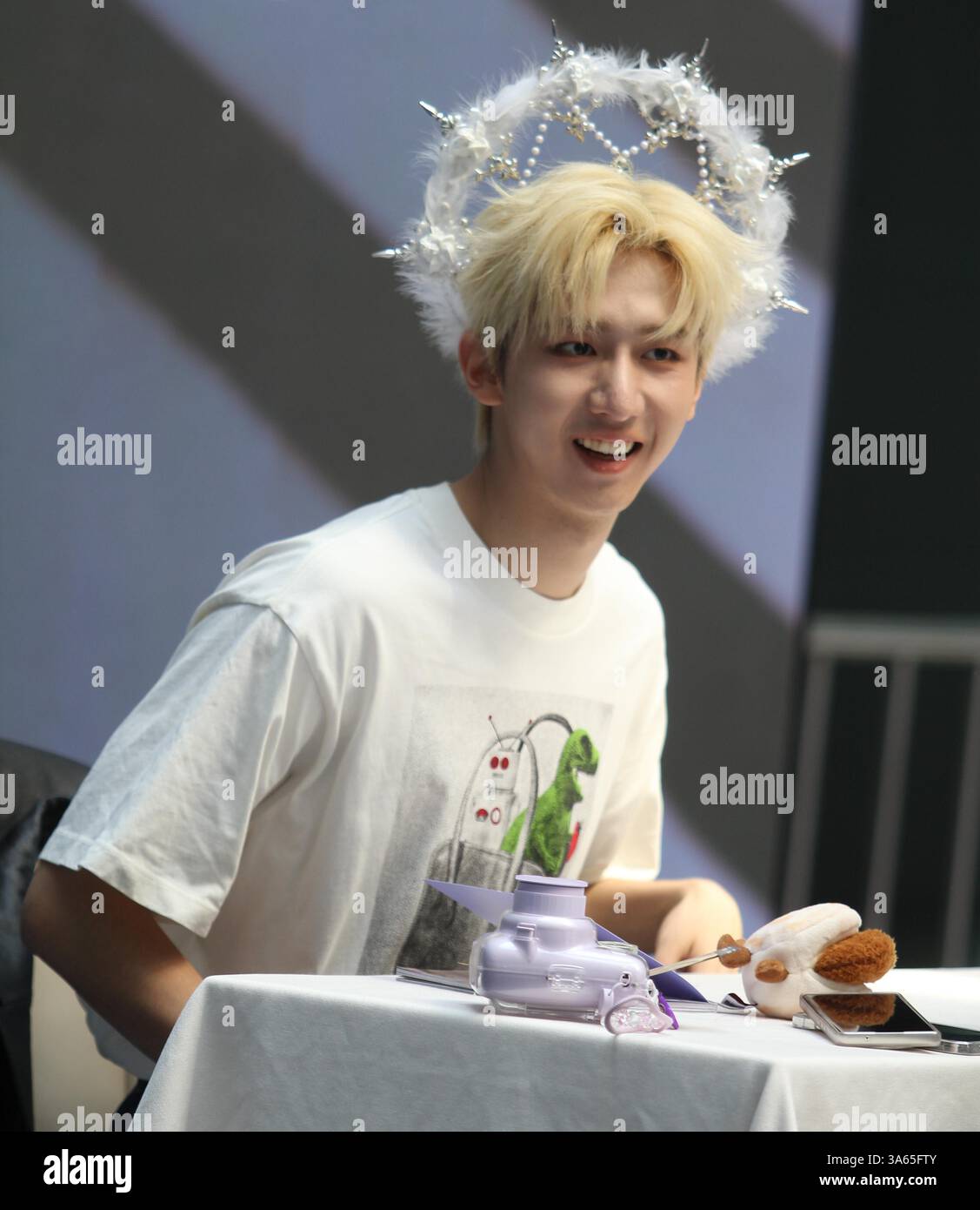 Chinese singer Zhao Rang attends an activity in Wuhan City, central ...