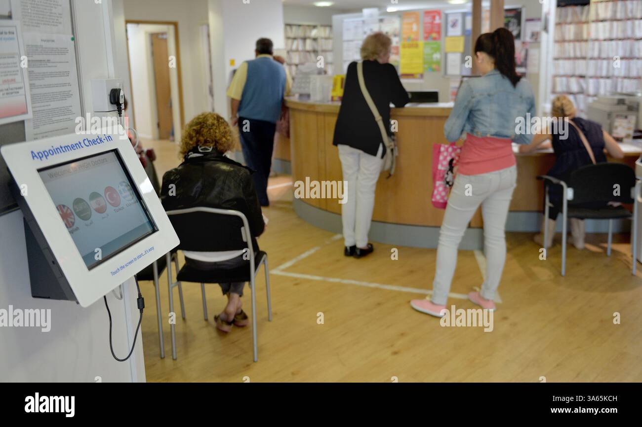File photo dated 10/09/14 of patients in the waiting room at a GP ...