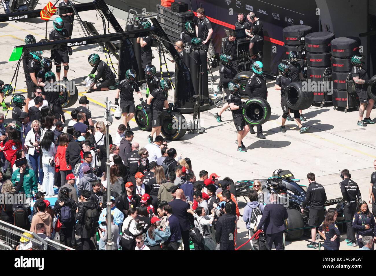 F1 fans watch the training of participating teams at the maintenance ...