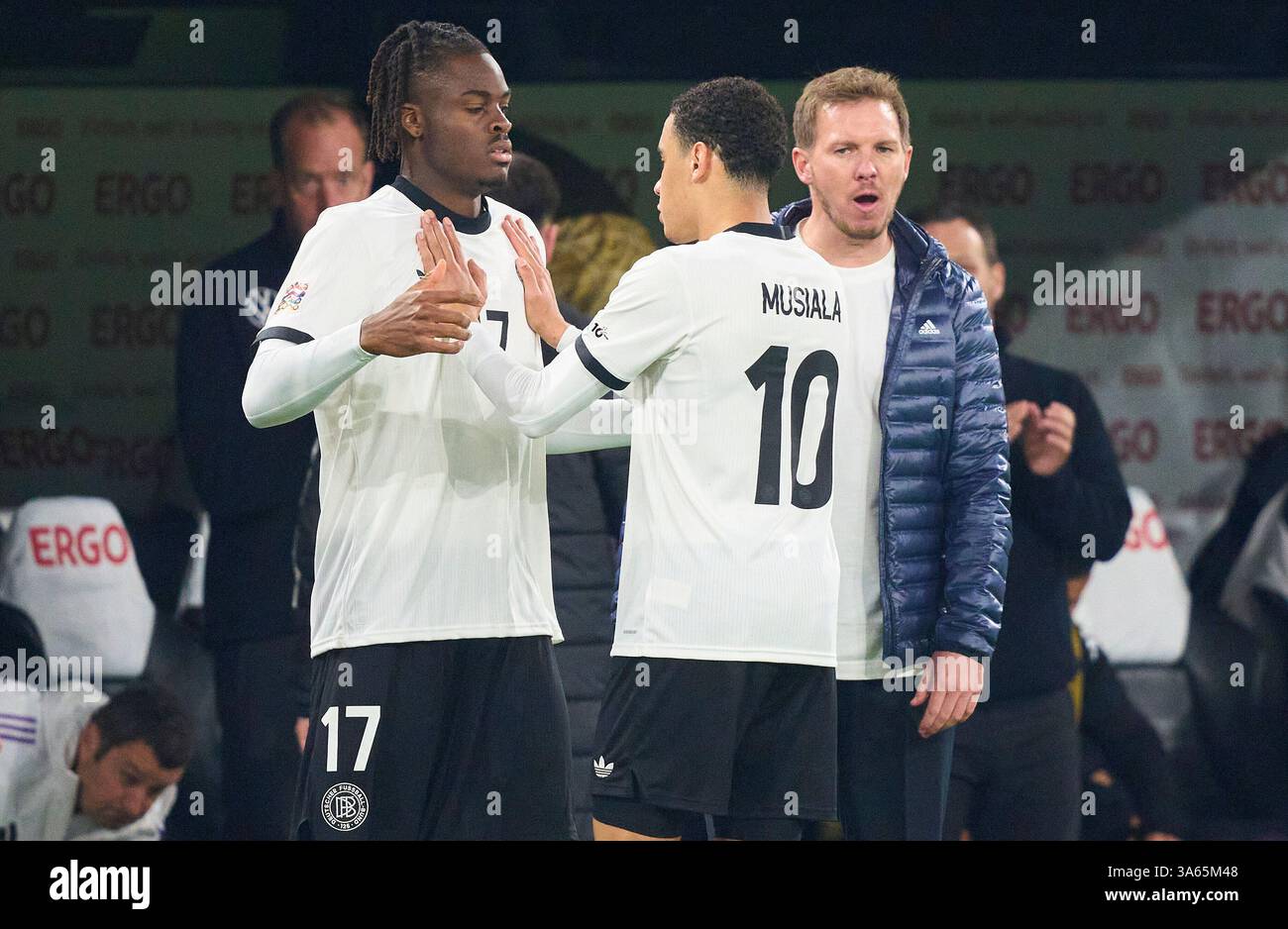 Dortmund, Germany. 23rd Mar, 2025. Jamal Musiala, DFB 10 Yann Bisseck, Nr. 17 DFB DFB headcoach ...