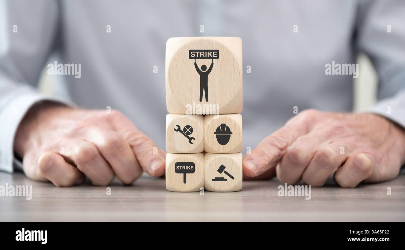 Wooden blocks with symbol of strike concept Stock Photo - Alamy
