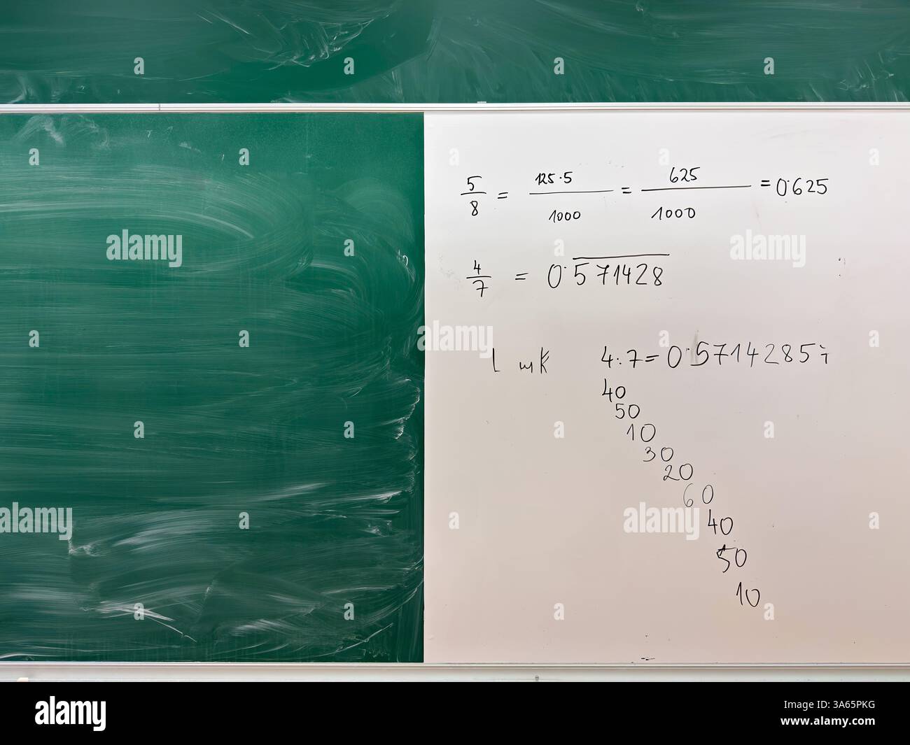 A dual classroom board setup featuring a green chalkboard and a ...