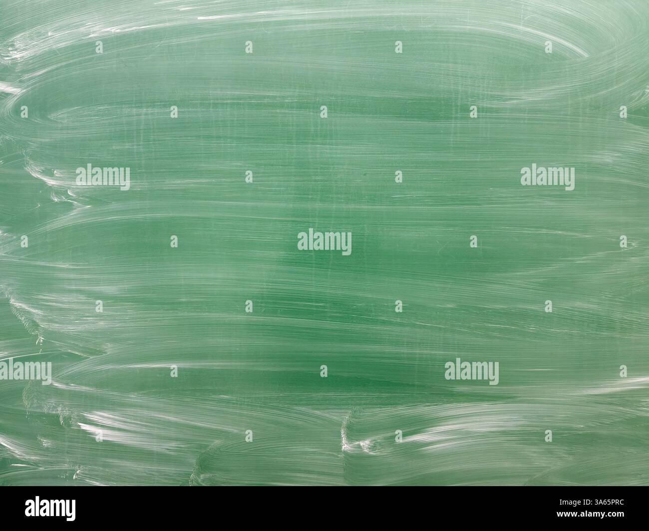 Wiped Clean Green Chalkboard Background in Classroom Stock Photo - Alamy