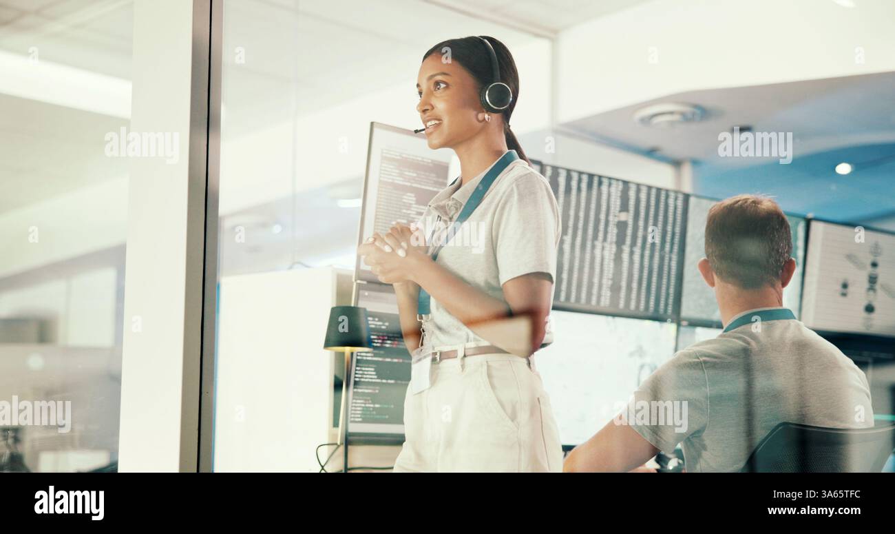 Talking, woman and meteorologist by window in office with headset for ...