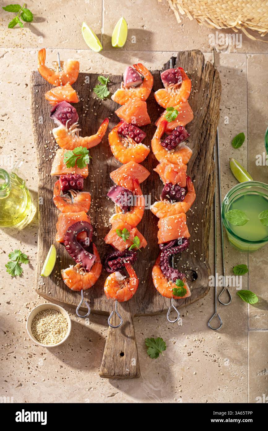 Preparation of spicy grilled skewer as summer delicacy. Roasted ...