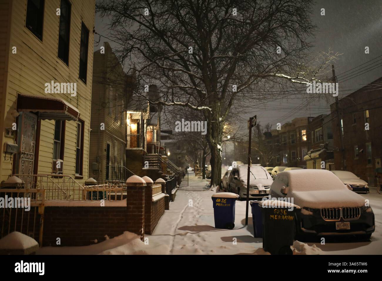 A view of a snow-covered street in the Ridgewood neighborhood of Queens ...