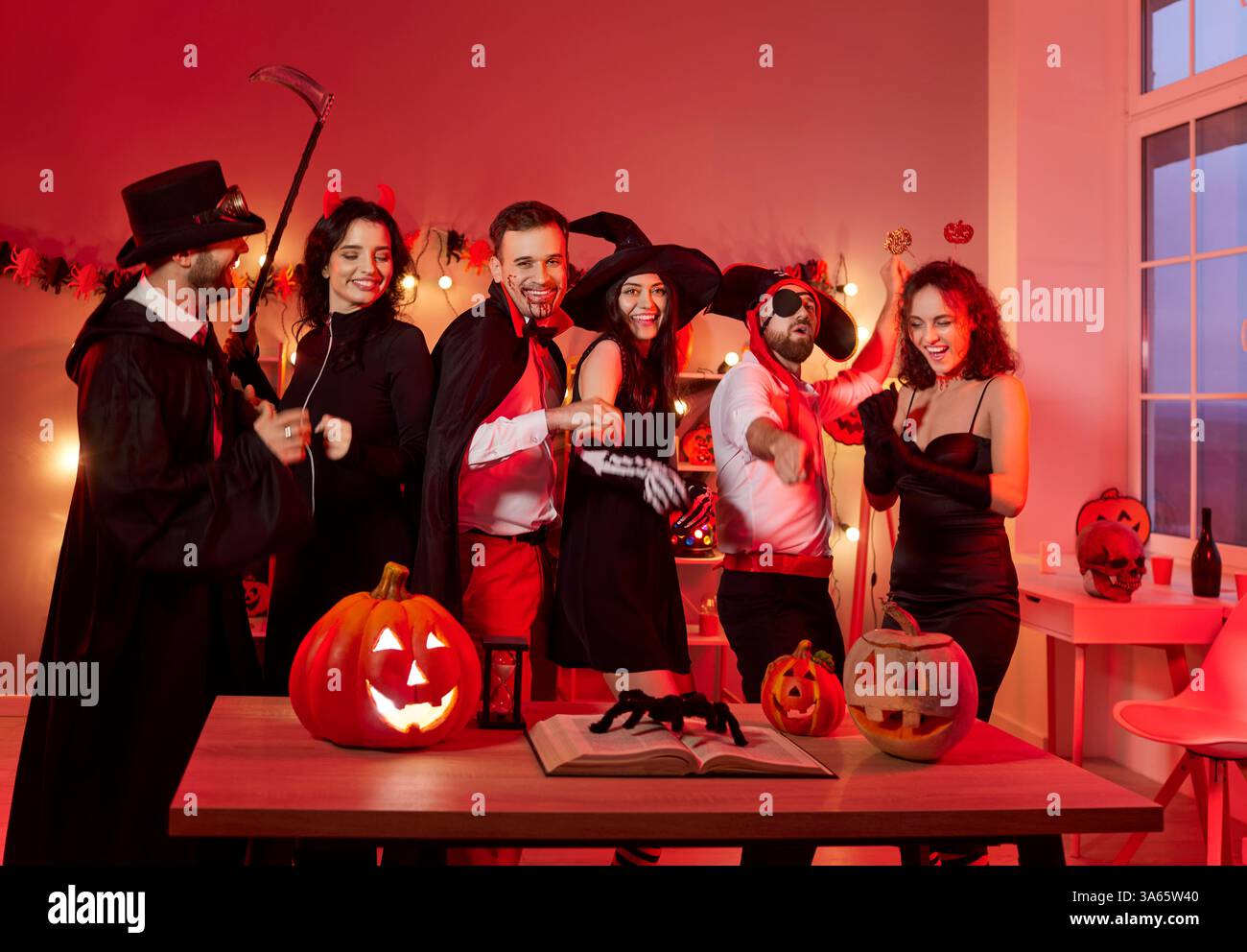 Happy Halloween party, friends group cosplay costume fun, pumpkin decor ...