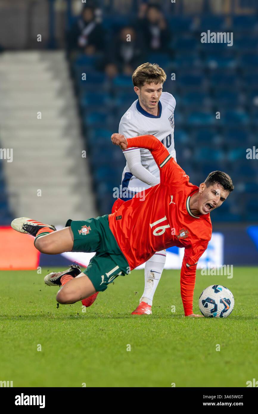 James McAtee 10 for England and Goncalo Nogueira 16 for Portugal in action during the ...