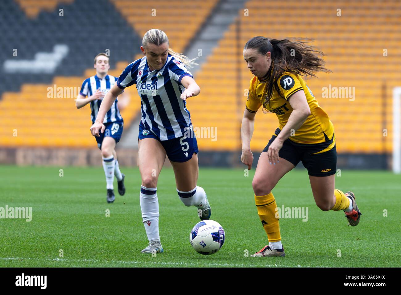 Taylor Reynolds (5) for West Brom and Beth Merrick (28) for Wolves in ...