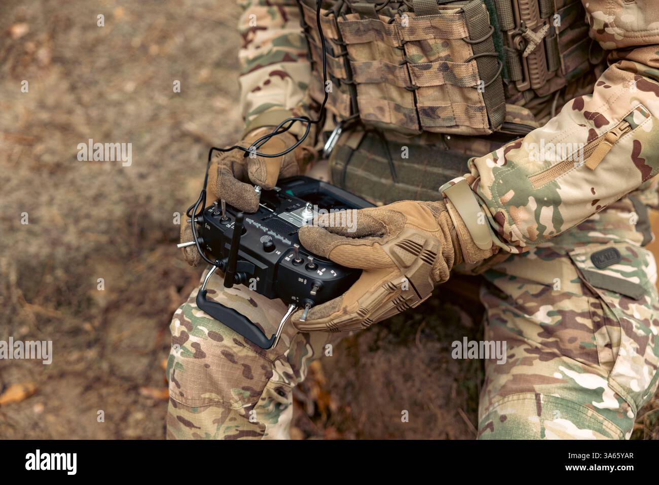 Soldier using remote controlling device hi-res stock photography and ...