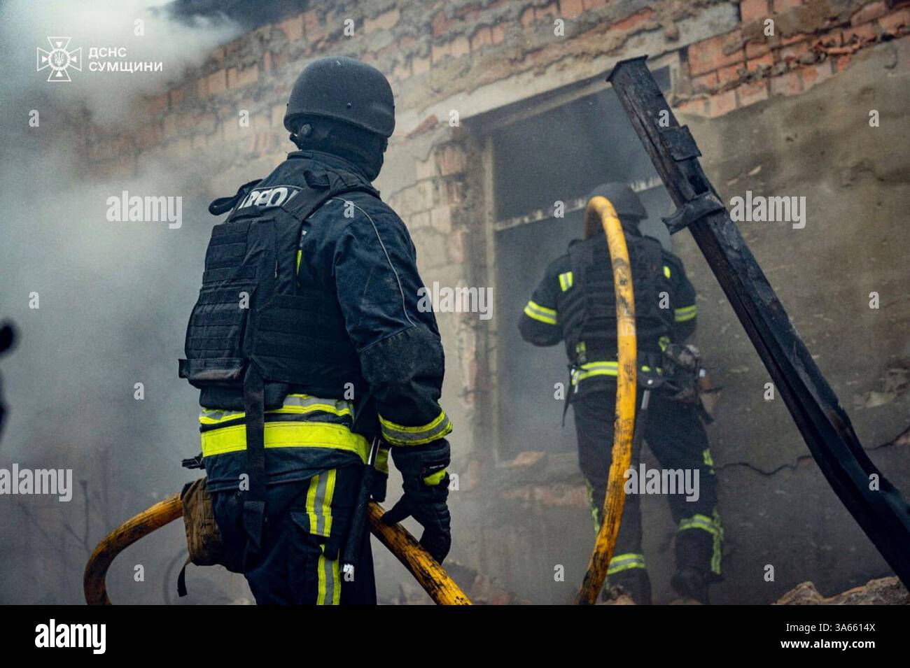 In this photo provided by the Ukrainian Emergency Service, firefighters ...