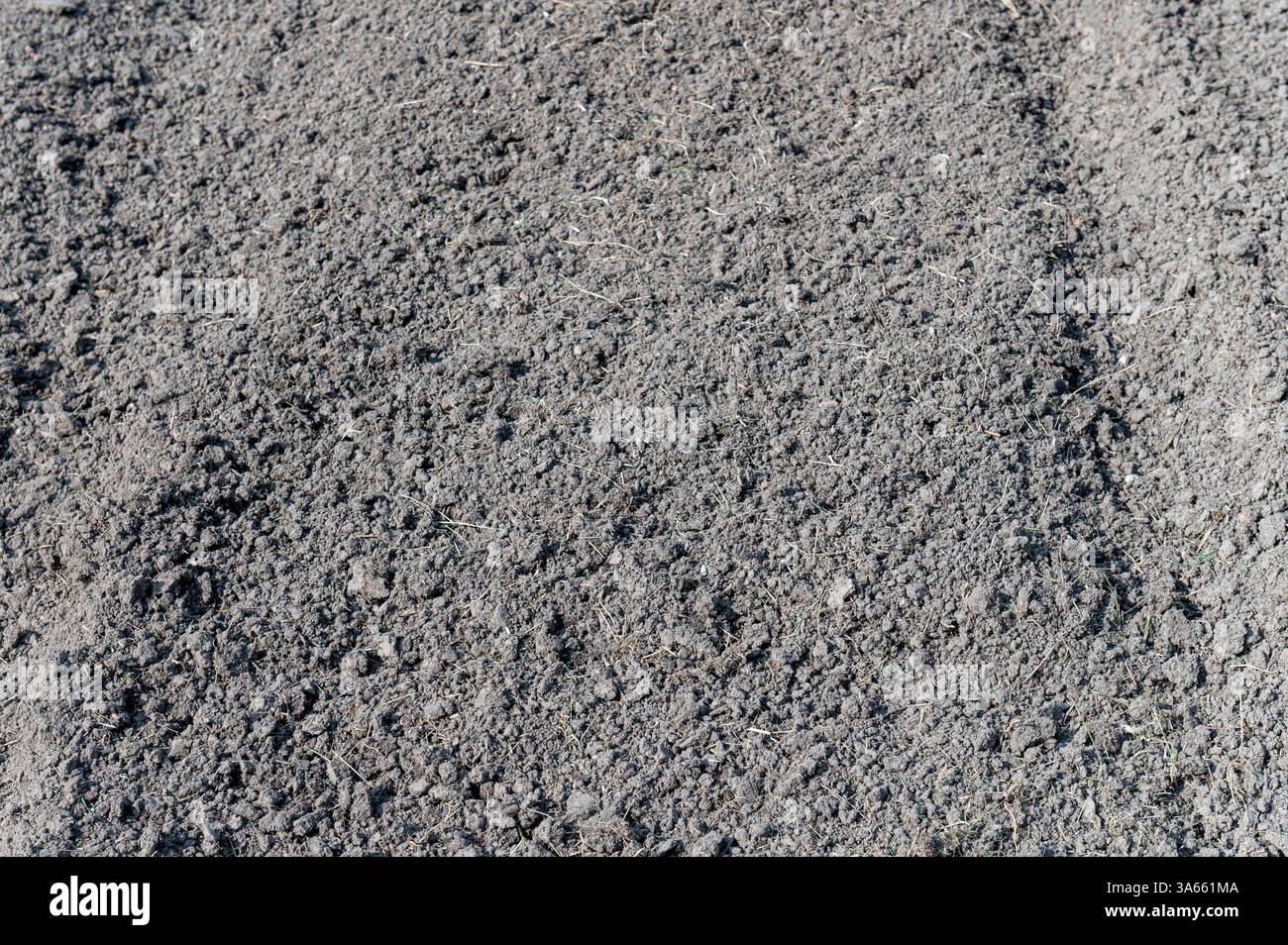 General stock - gardening. Clay Soil freshly tilled and ready for ...