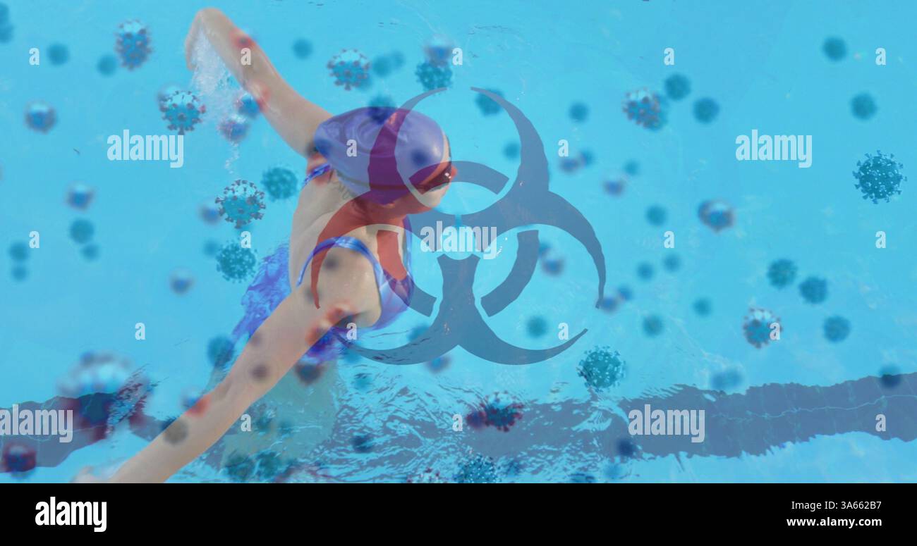 Image of a hazard sign with cells floating over caucasian woman ...