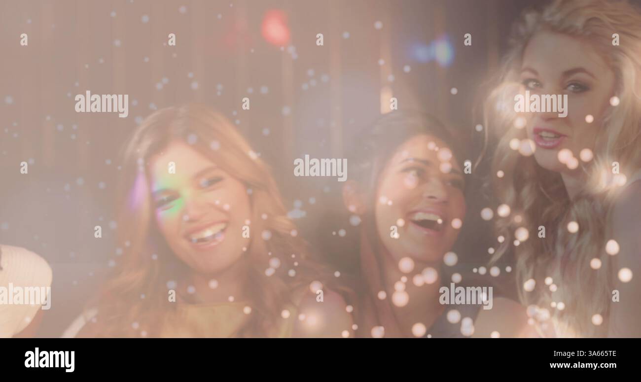 Image of white spots of light over multi-ethnic group of happy ...