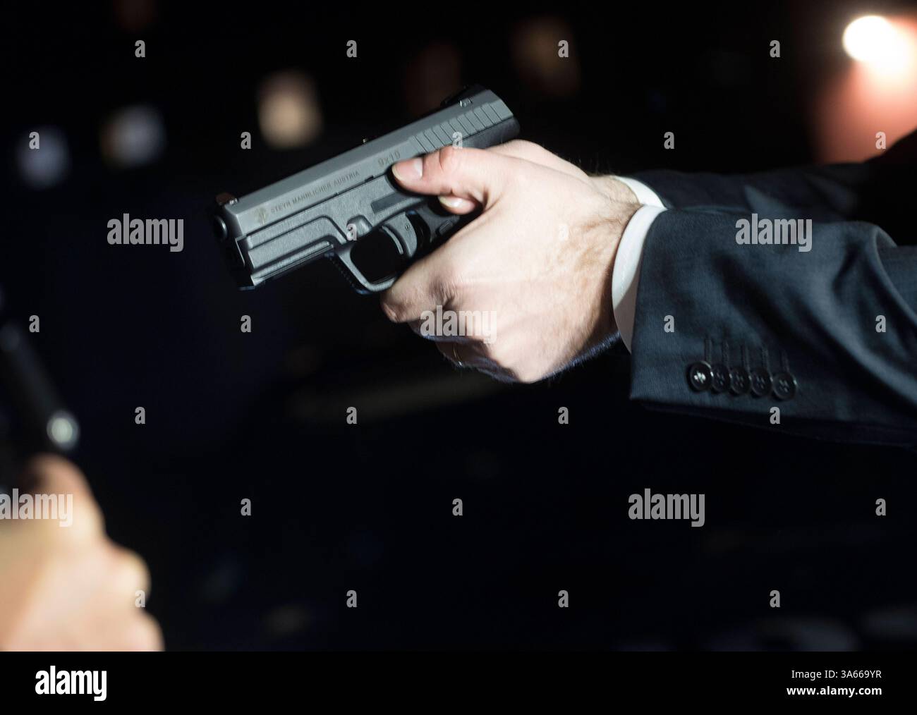 pistol, a handgun for shooting at an attacker or target pistol, a ...