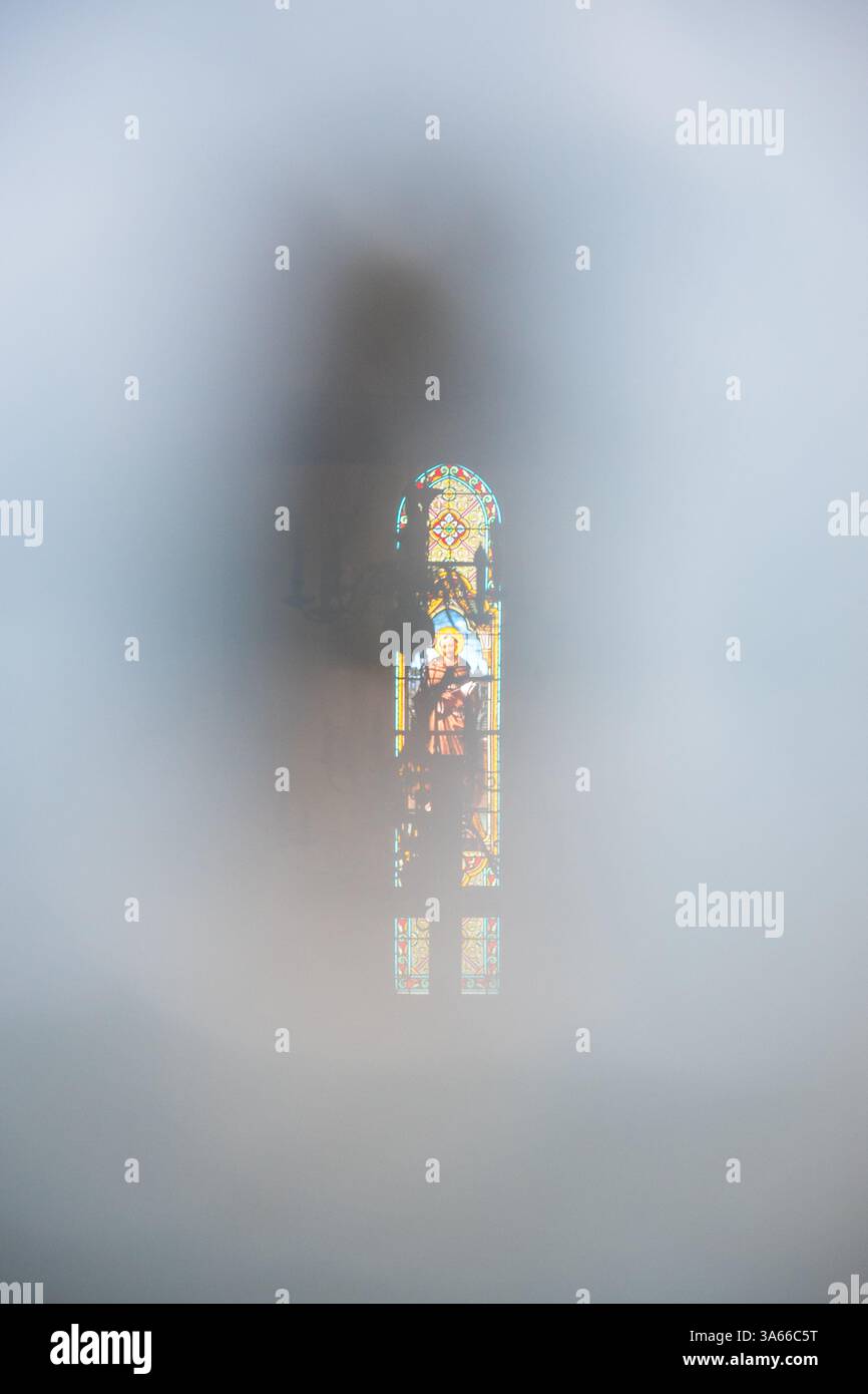 BRITANNY, FRANCE - AUGUST 4, 2018: Stained glass window with Saint ...