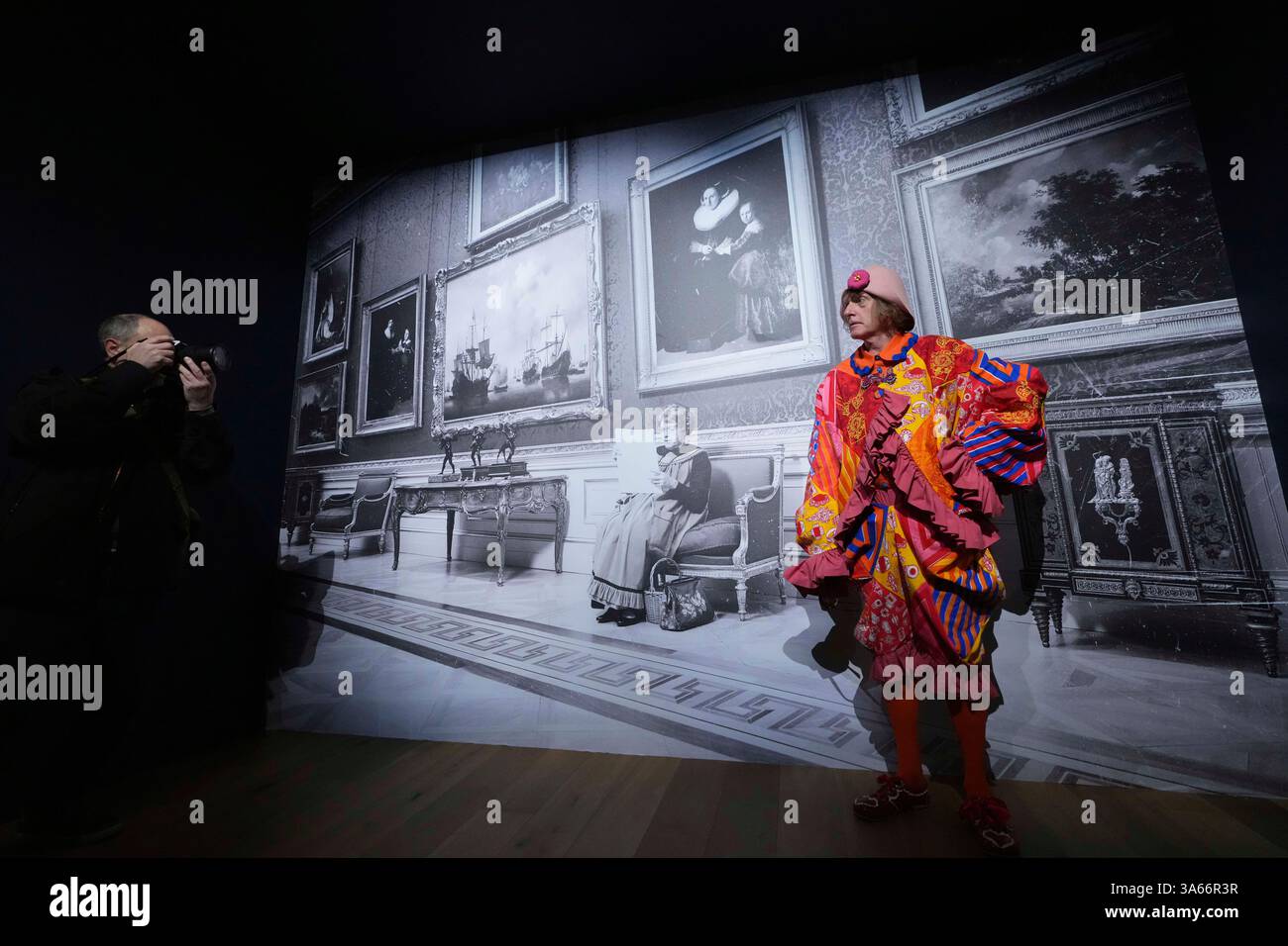 Artist Sir Grayson Perry poses in front of one of his artworks on ...