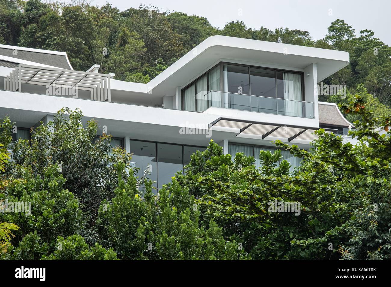 Front facade modern beautiful white villa. Luxury villa house with ...