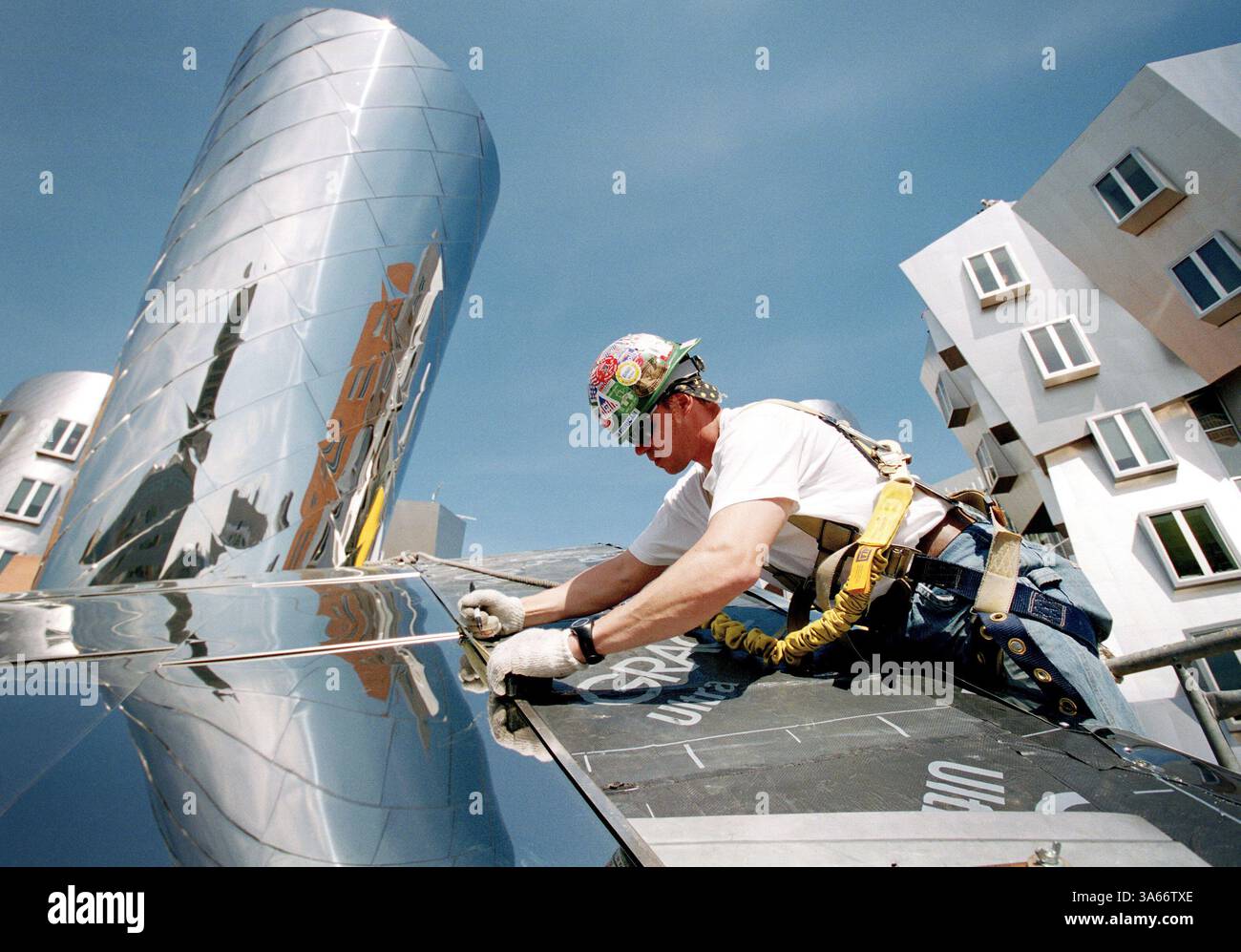 May 04, 2004; Cambridge, MA, USA; Workman completing the metal finish ...
