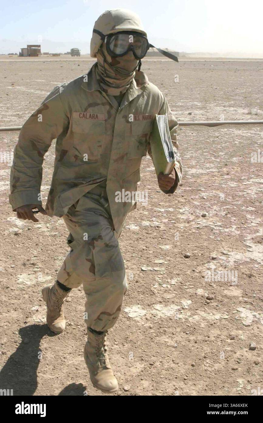 May 22, 2004; FOB Ripley, Afghanistan; Lance Cpl. CHERWIN CALARA races ...