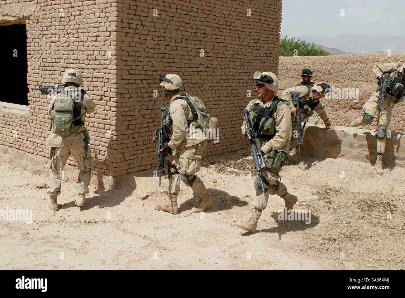 May 24, 2004; Oruzgan, Afghanistan; Marines from 3d Plt., Bravo Co ...