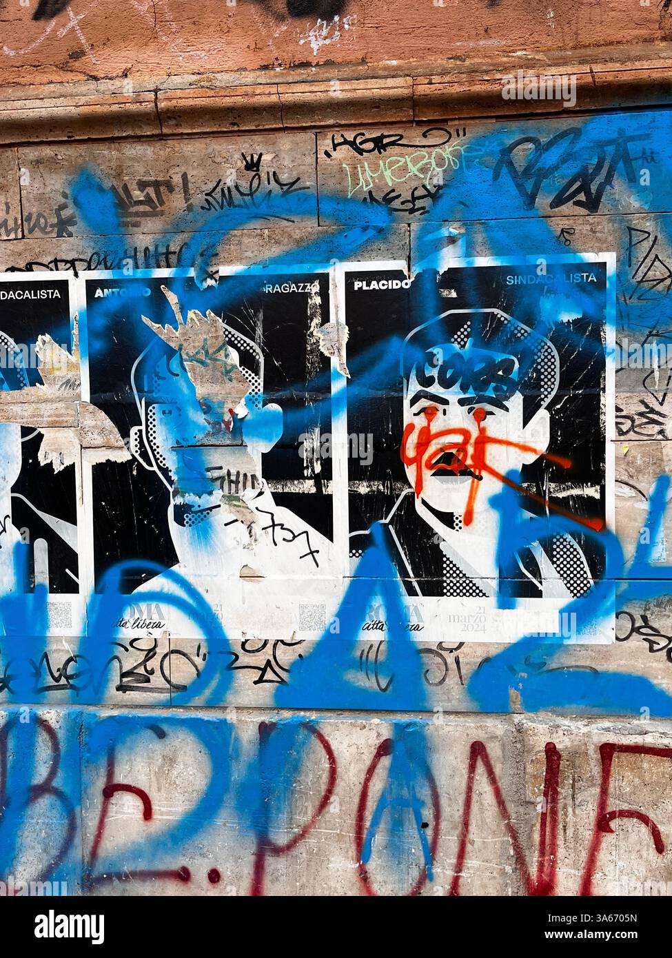Rome, Italy - March 2025 - posters, thorn, wall, art, graffiti ...