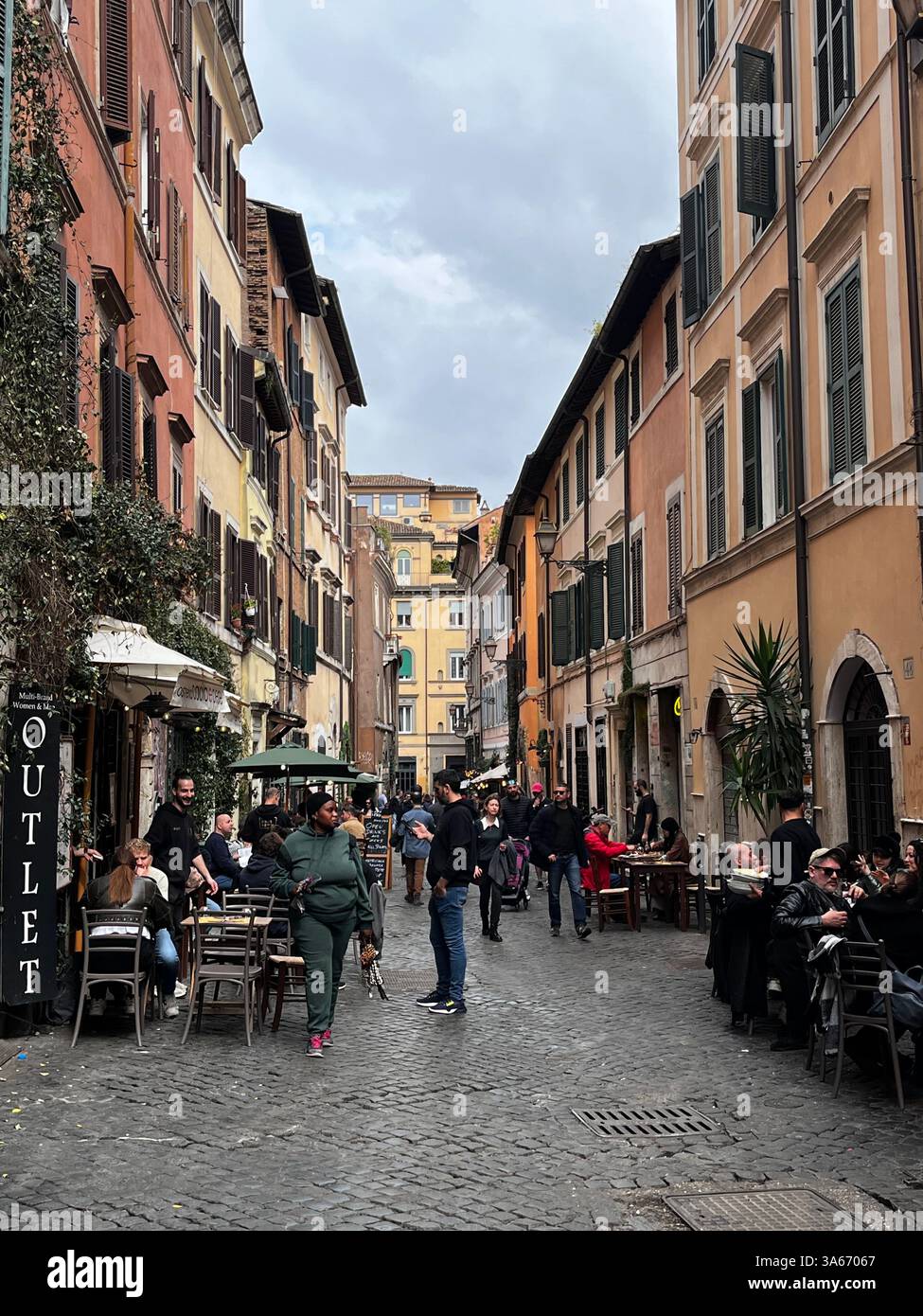 Rome, Italy - March 2025 - Trastevere District, narrow cobbled streets ...