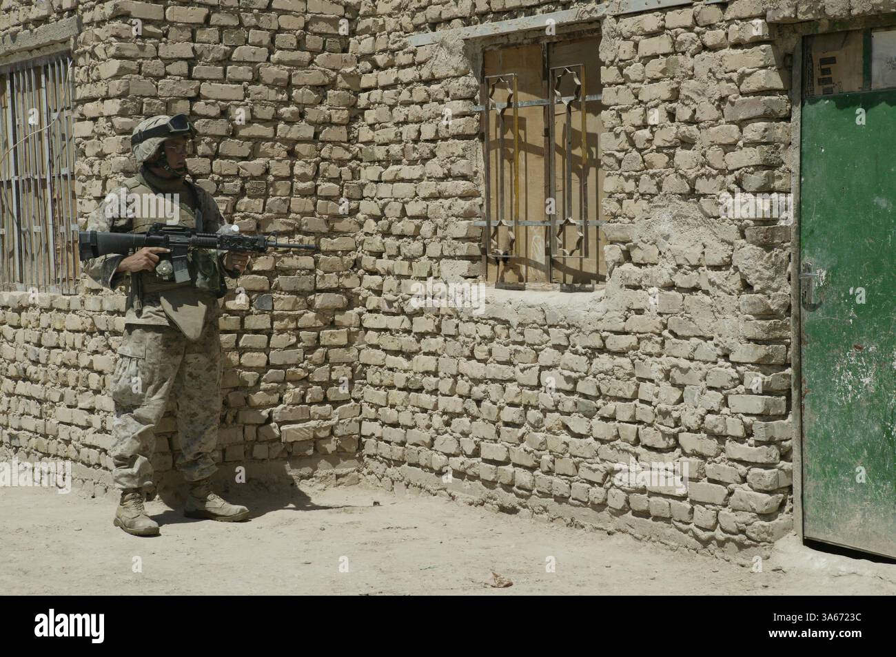 Aug 24, 2004; Fallujah, Iraq; A Marine with Company K, 3rd Battalion ...