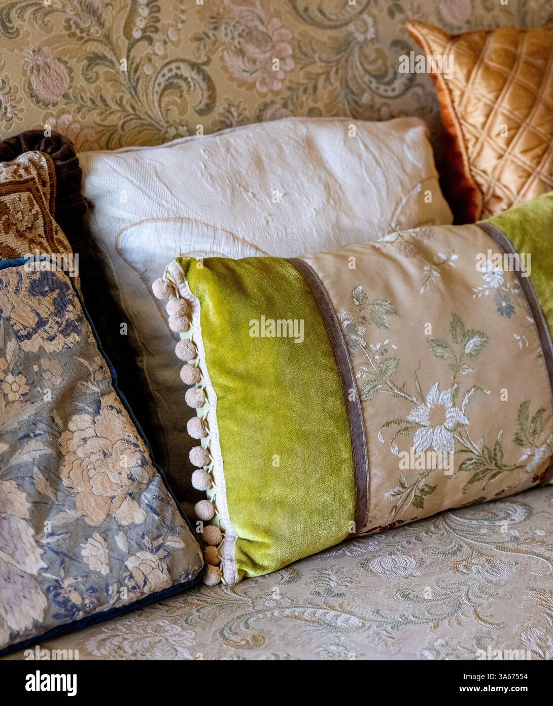 Colourful sofa cushions at an English country house in Devon Stock ...