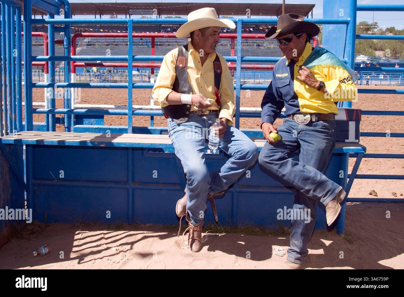 Sep 10, 2004; Window Rock, AZ, USA; Navajo cowboys chat behind the ...
