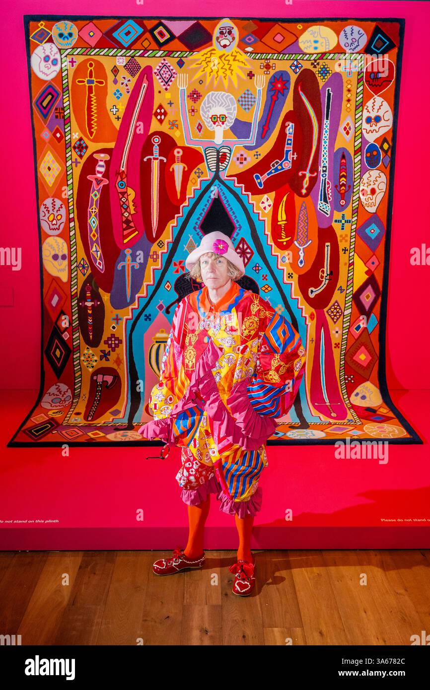 London, UK. 25 Mar 2025. The artist with Heavens Gate - Grayson Perry ...