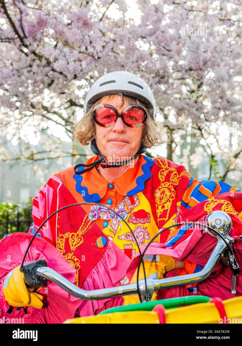 London, UK. 25th Mar, 2025. The artist arrives on his bicycle - Grayson ...