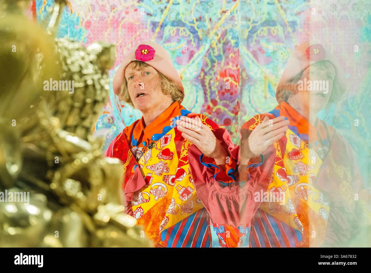 London, UK. 25th Mar, 2025. The artist is interviewed behind Sissy's ...