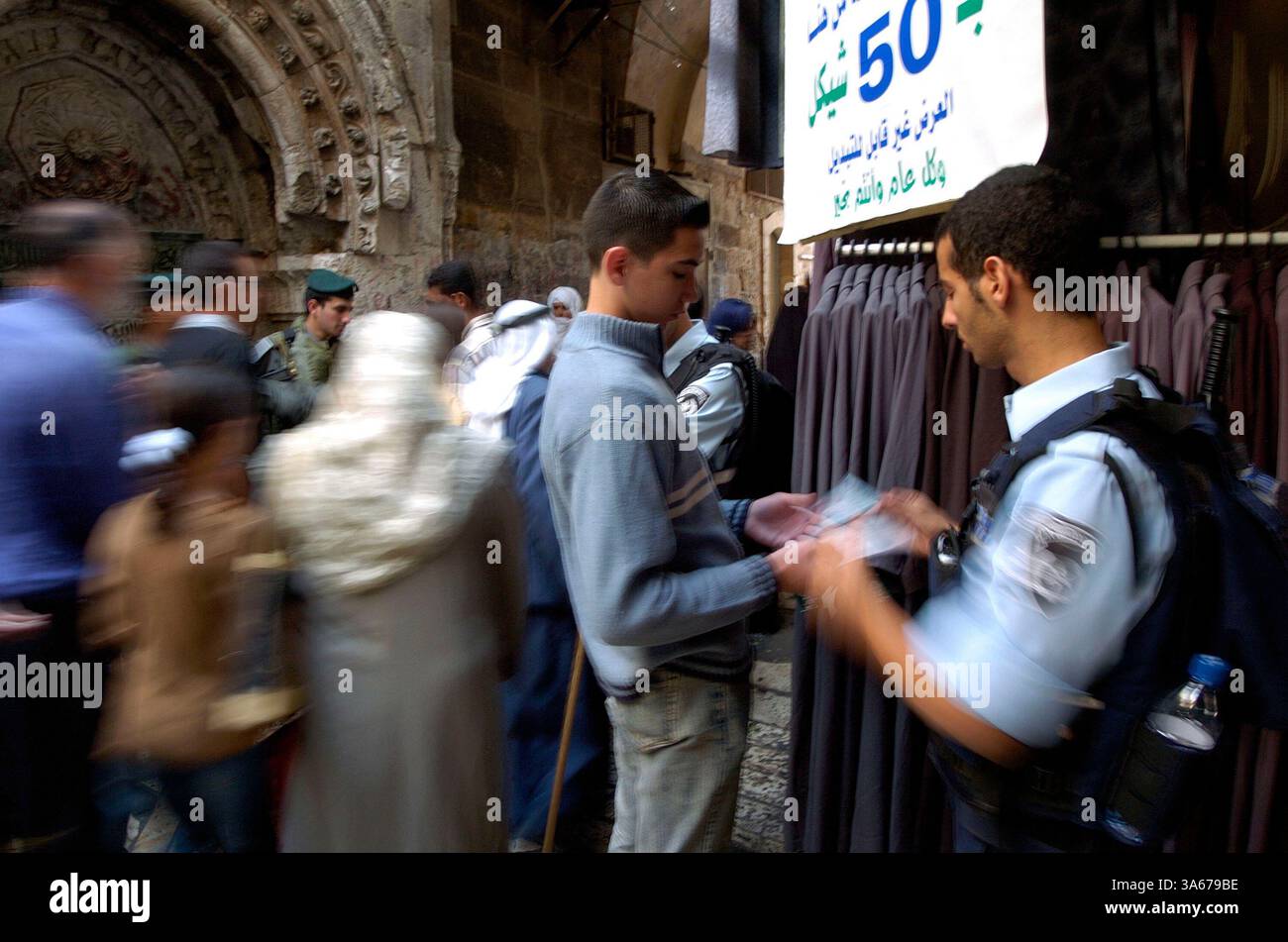 Oct 15, 2004; Jerusalem, ISRAEL; A Palestinian is stopped for an I.D ...