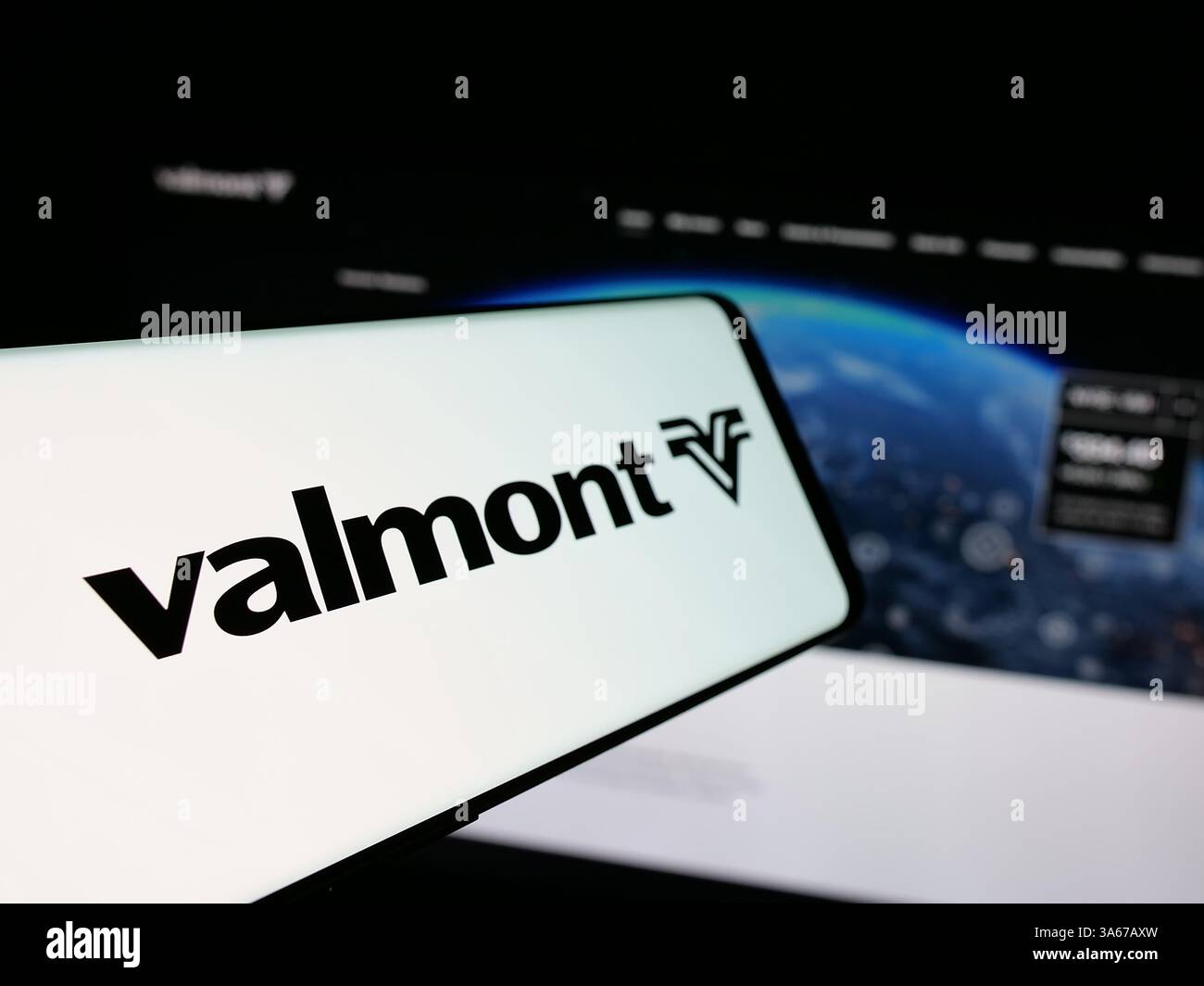 In this photo illustration, a smartphone with the logo of American ...