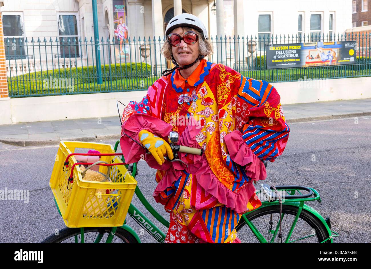 London, UK. 25 3 25 Grayson Perry arrives on his bicycle. The Wallace ...