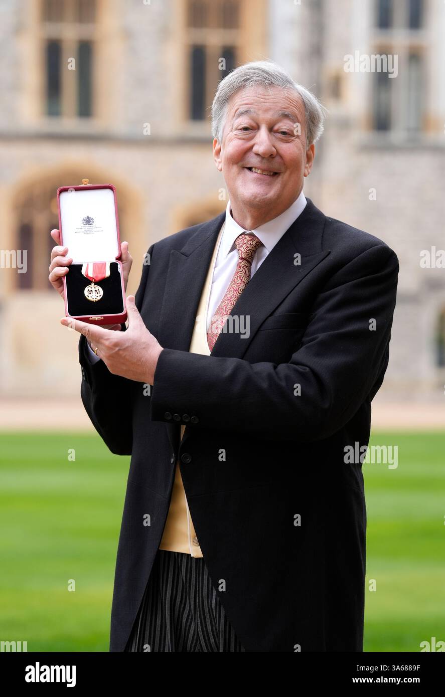 Sir Stephen Fry after being made a Knight Bachelor at an Investiture ...