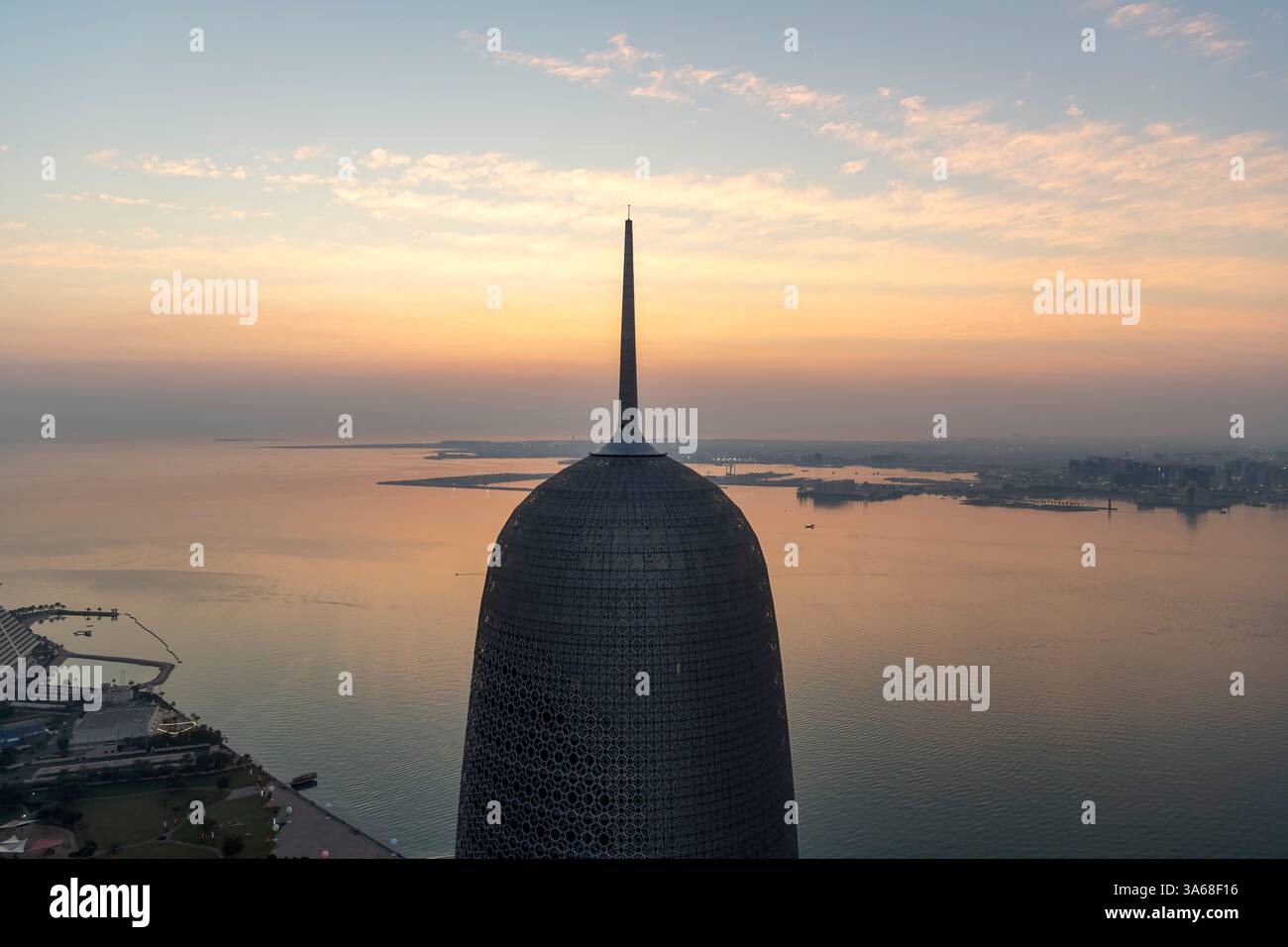 Sunrise view of Burj Doha . Iconic Doha Tower west bay Doha Qatar Stock ...