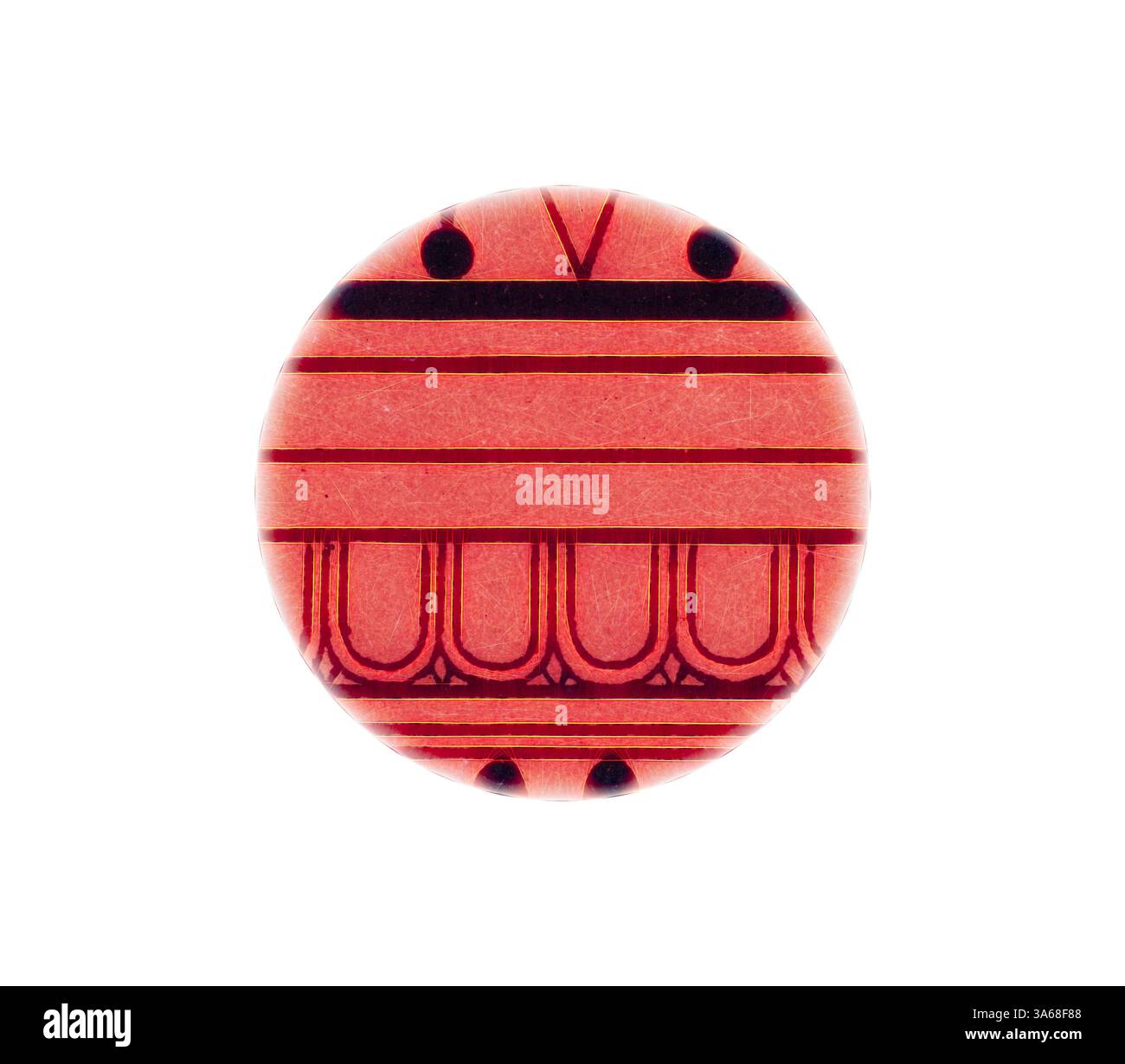 A circular, decorative object featuring intricate patterns in warm ...