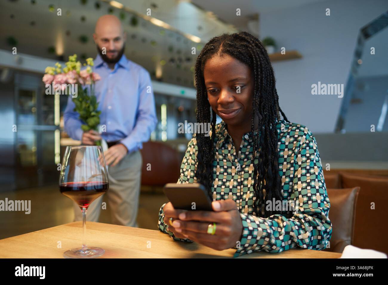Woman Waiting For Man In The Restaurant Stock Photo - Alamy